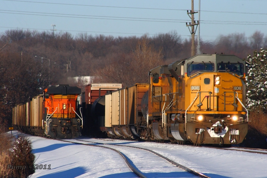 Southbound UP Manifest Train Meeting a Northbound BNSF Empty Coal Train